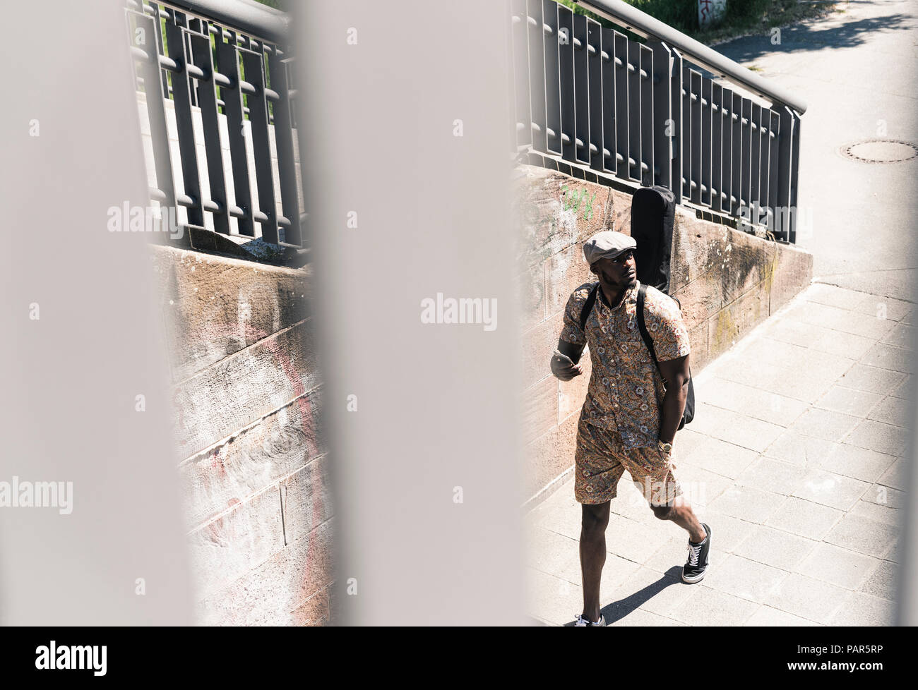 Man carrying musical instrument hi-res stock photography and images - Alamy