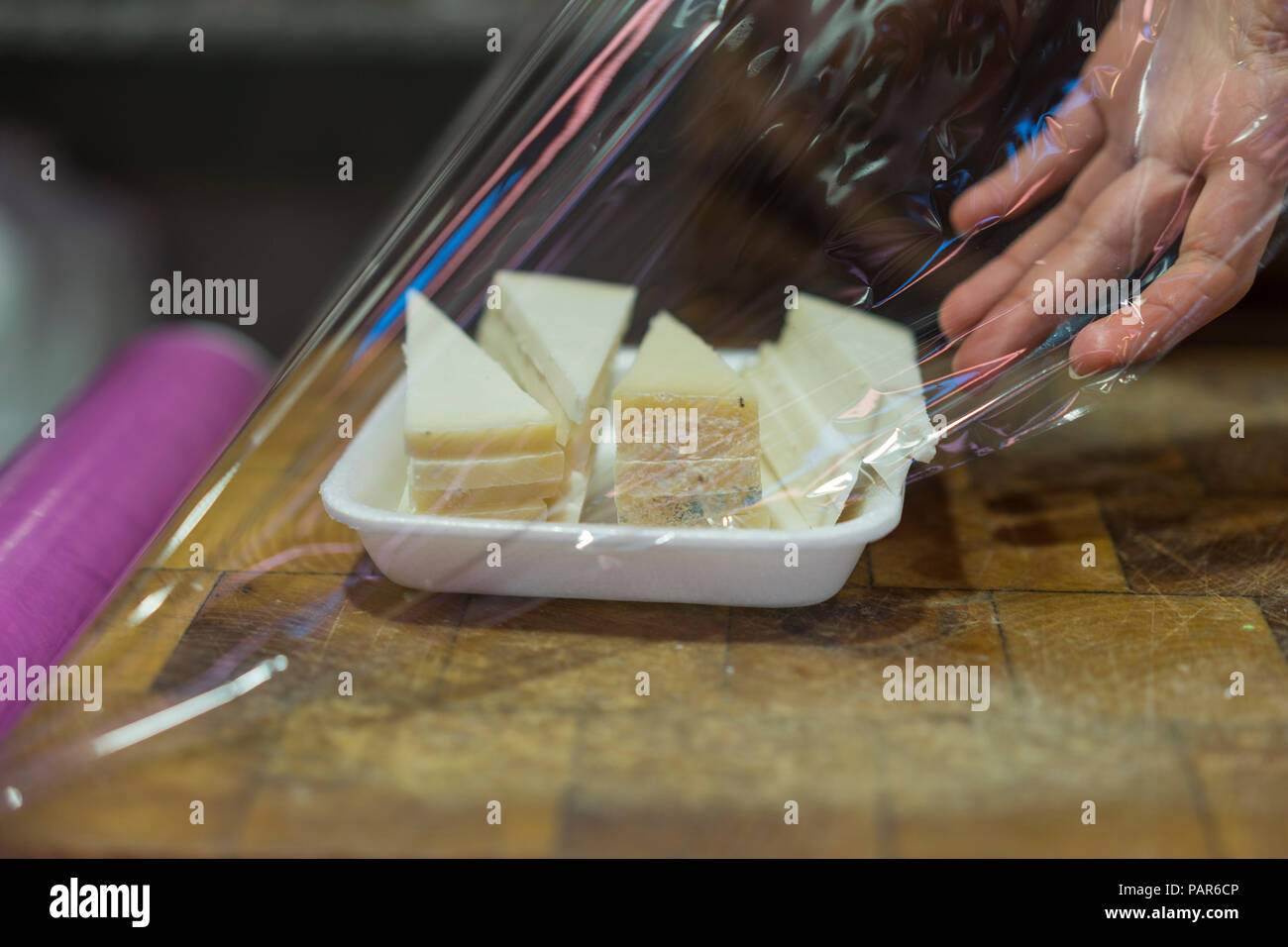 Packing cheese hi-res stock photography and images - Alamy