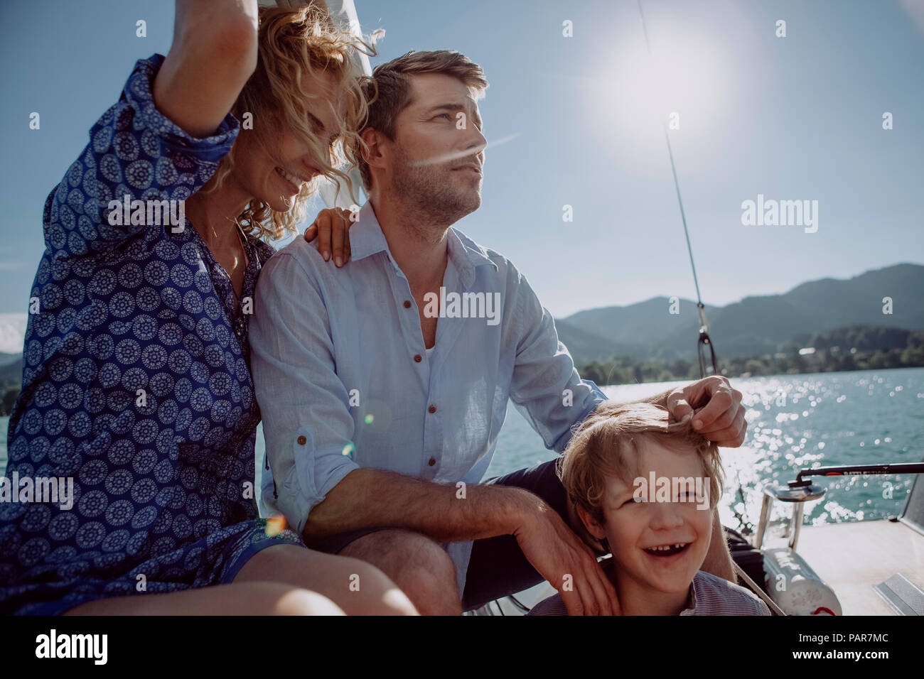 Family on a sailboat hi-res stock photography and images - Alamy