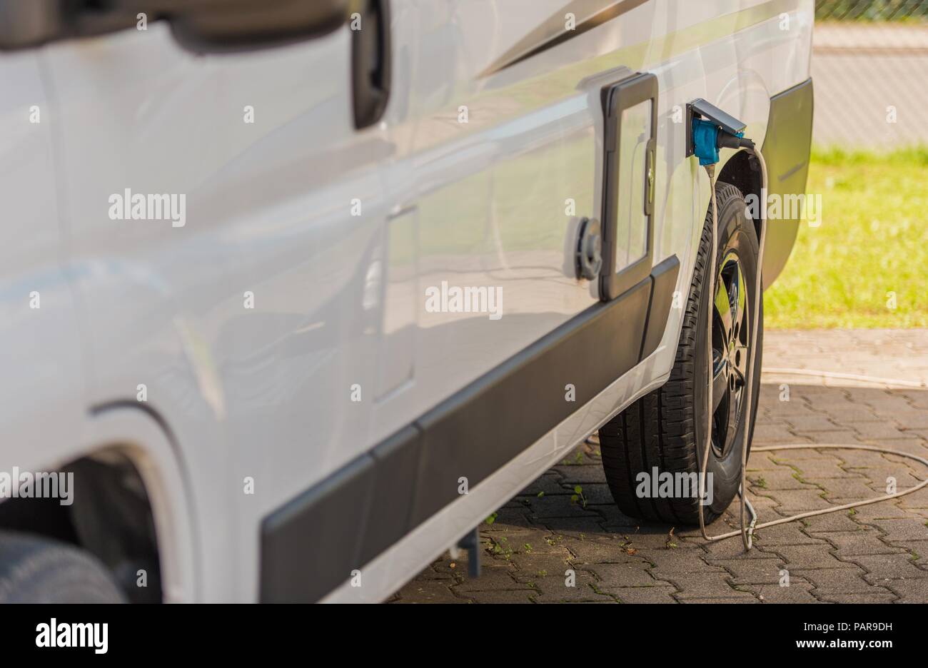 Camper Van Electric Hookup. Electricity Connection on the Camping Spot ...