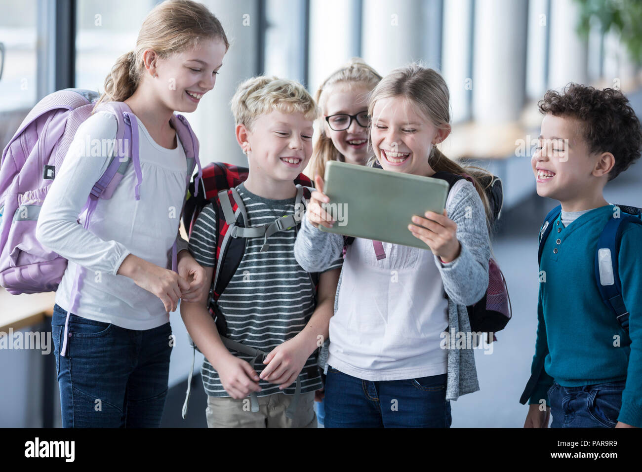 Laughing school girls hi-res stock photography and images - Alamy