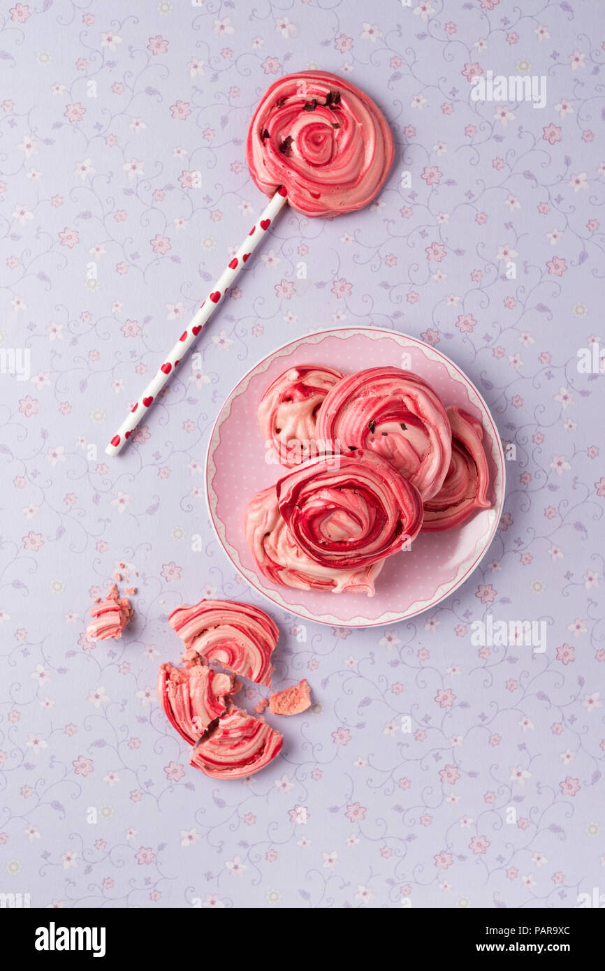 Homemade meringue with dried rose blossoms Stock Photo - Alamy