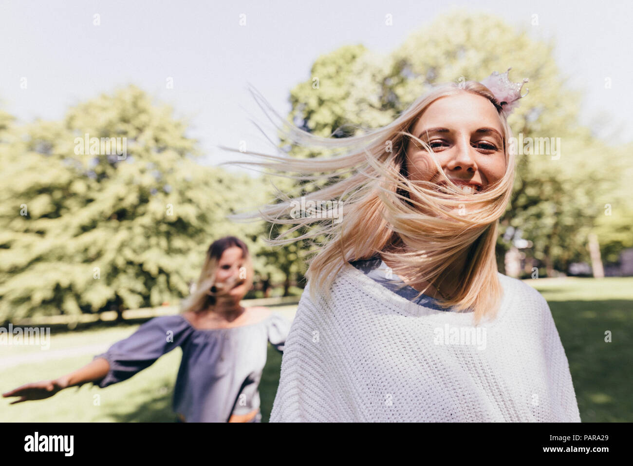 Two running women hi-res stock photography and images - Alamy