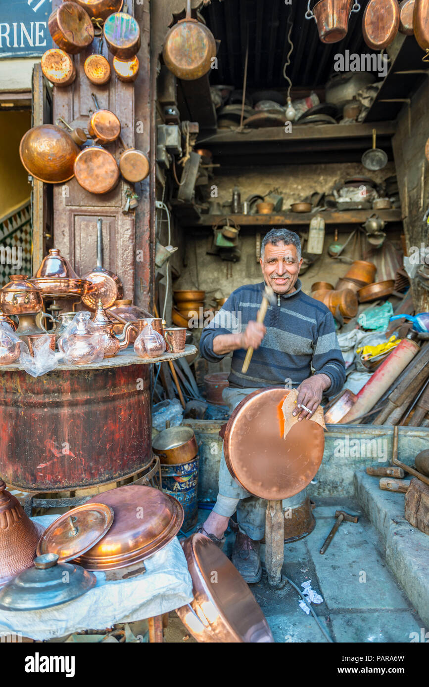 Coppersmith at work, copper market, Seffarine Square, Fes el Bali, Fez ...