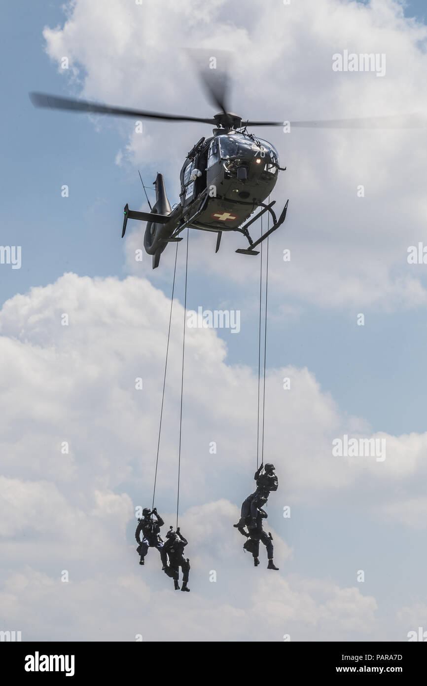 Special unit of police in exercise with helicopter, rescue team ropes ...