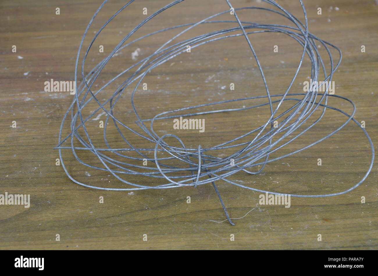 Barbed wire on table hi-res stock photography and images - Alamy
