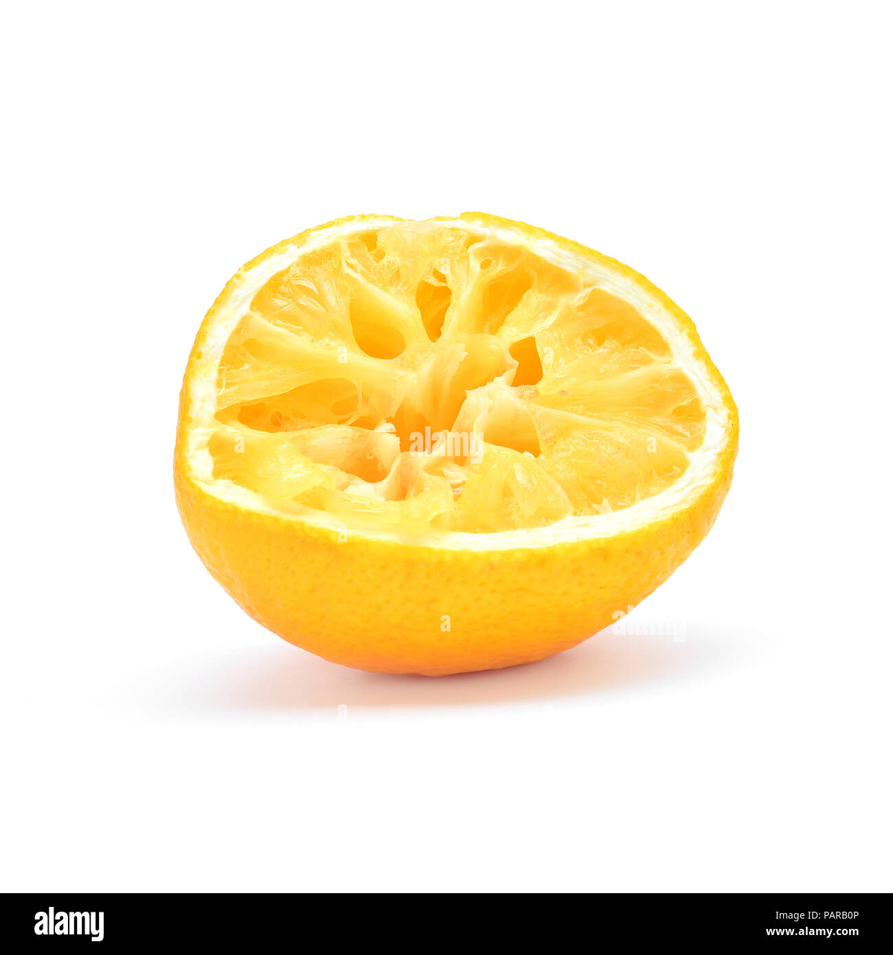 squeezed lemon isolated on white Stock Photo - Alamy