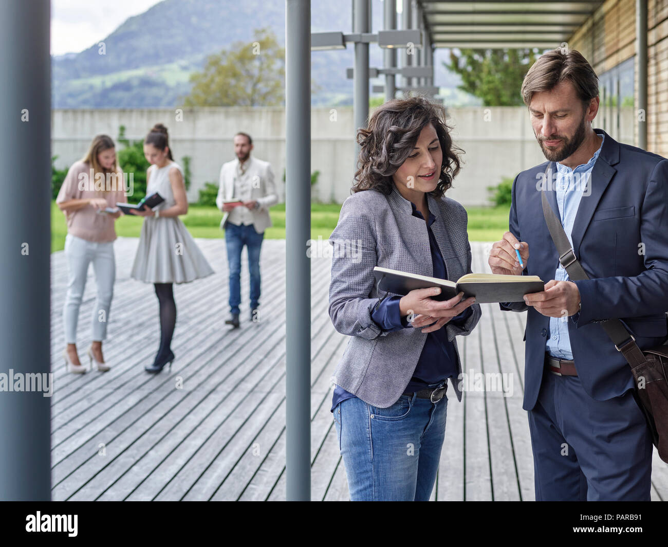 Males colleagues talking planning work hi-res stock photography and ...