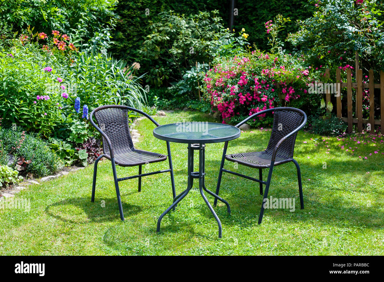 Flowers garden chair table hi-res stock photography and images - Alamy