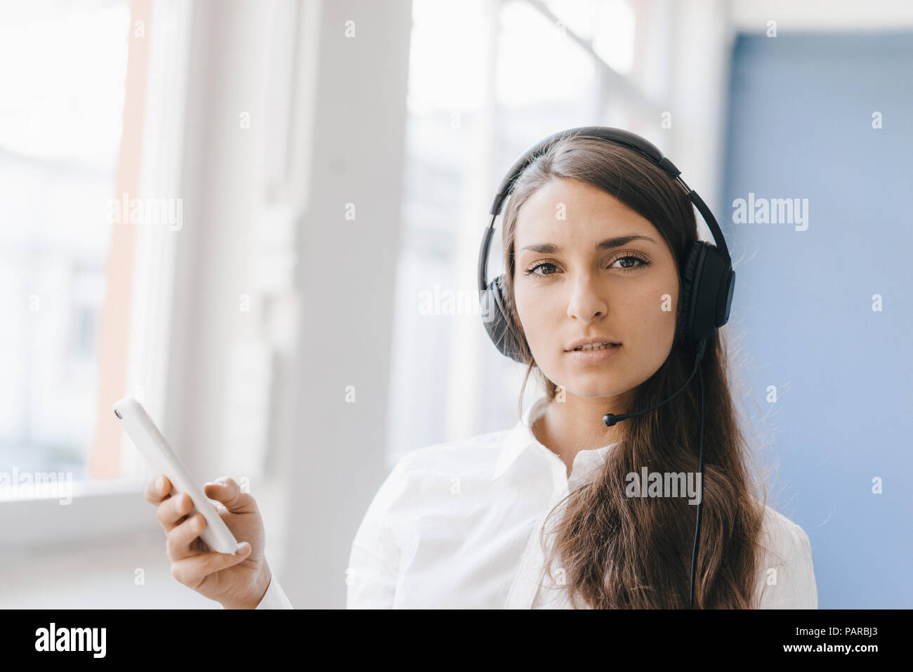 Woman wearing a telephone headset hi-res stock photography and images ...