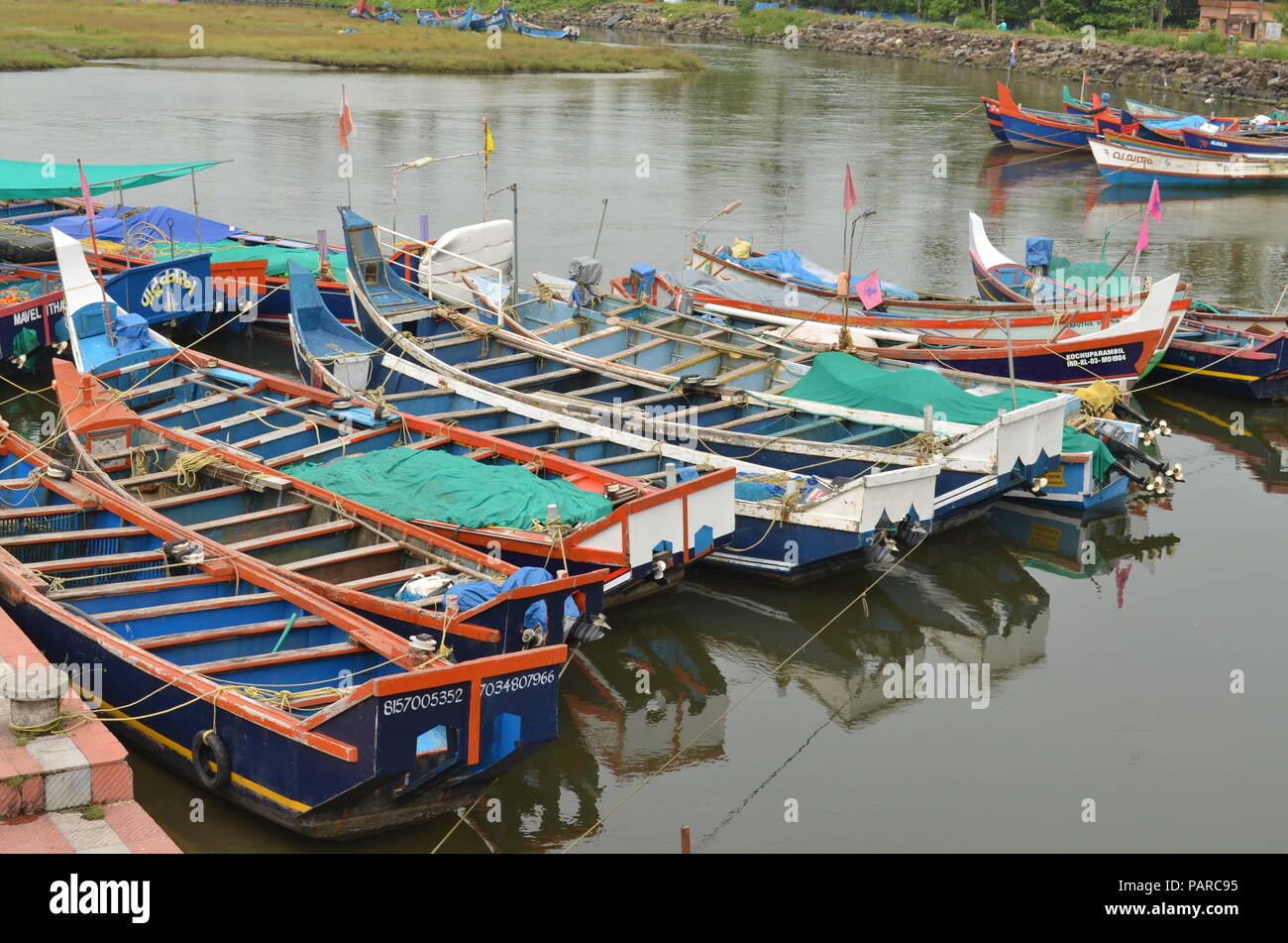 Many crowded fishing boats Stock Photo - Alamy