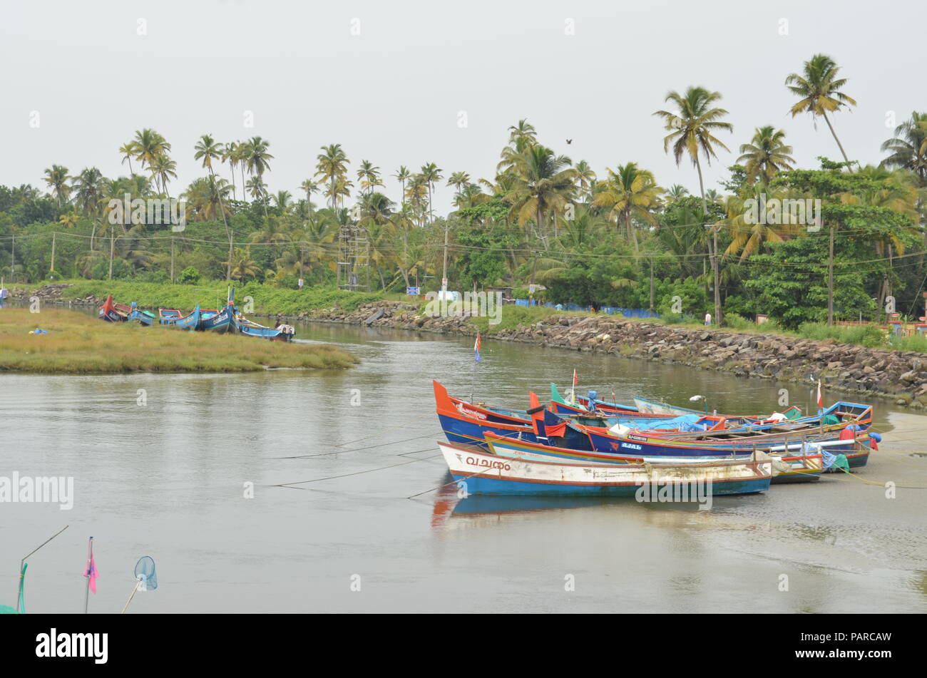 Many crowded fishing boats Stock Photo - Alamy