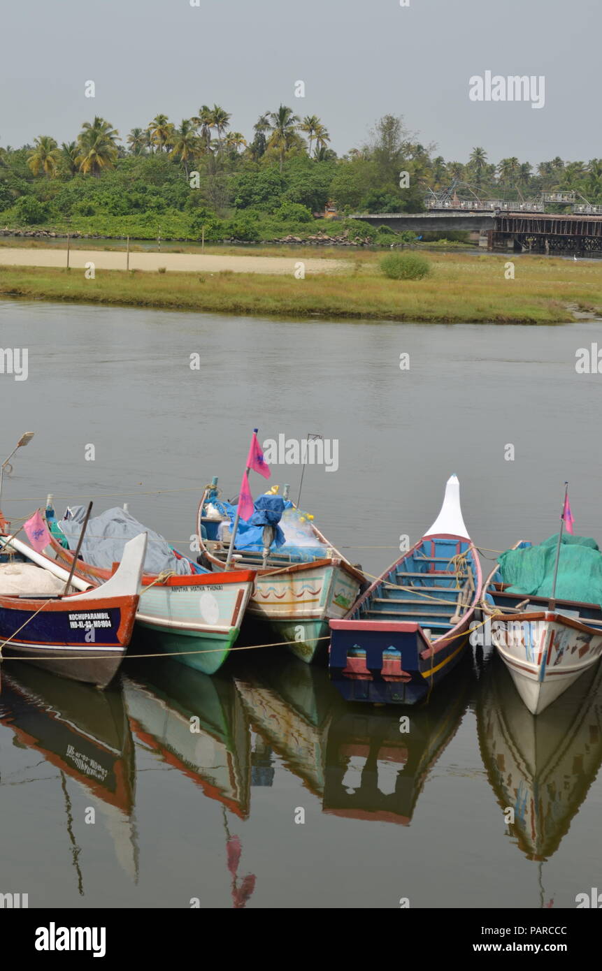 Many crowded fishing boats Stock Photo - Alamy