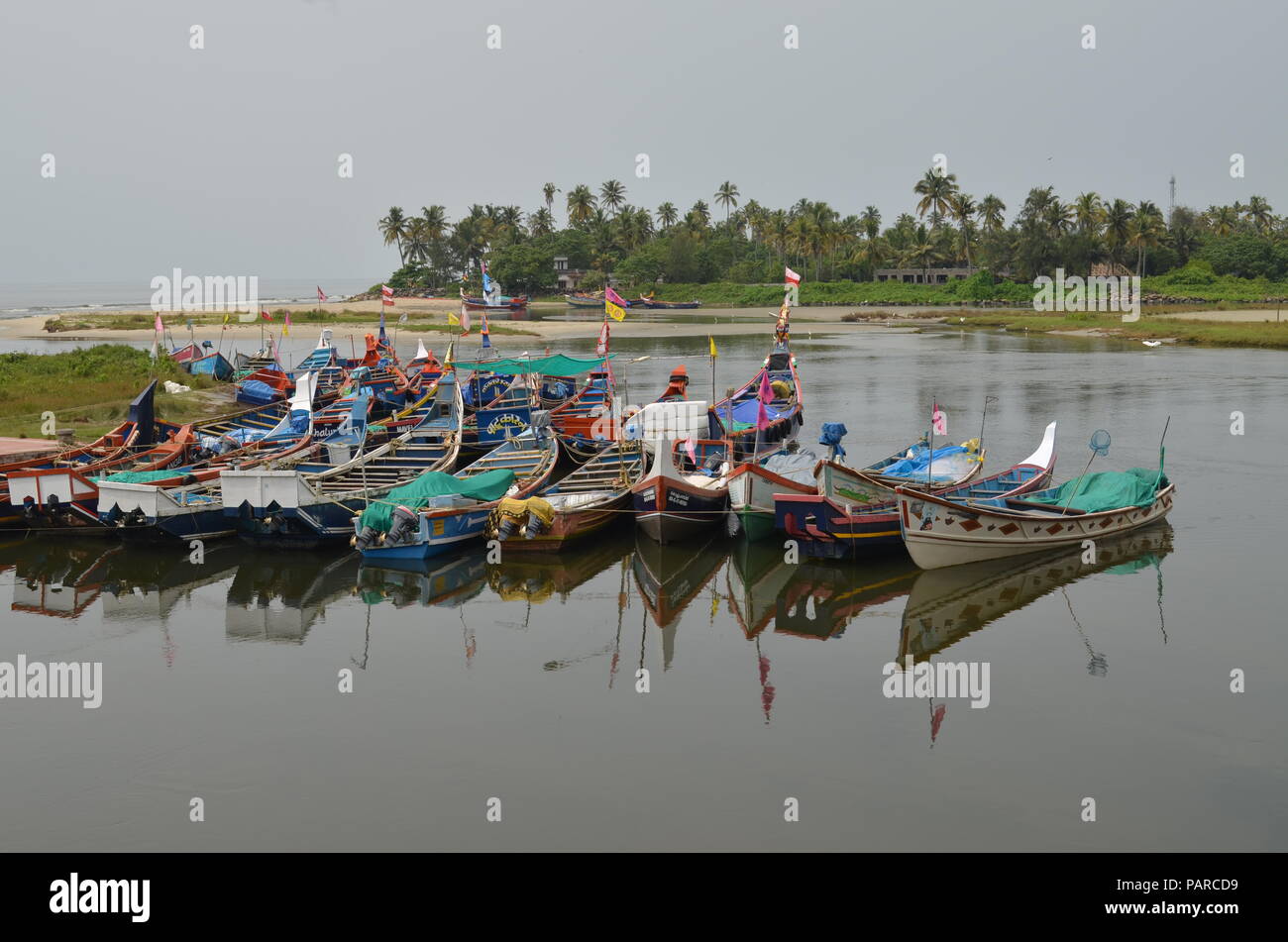 Many crowded fishing boats Stock Photo - Alamy