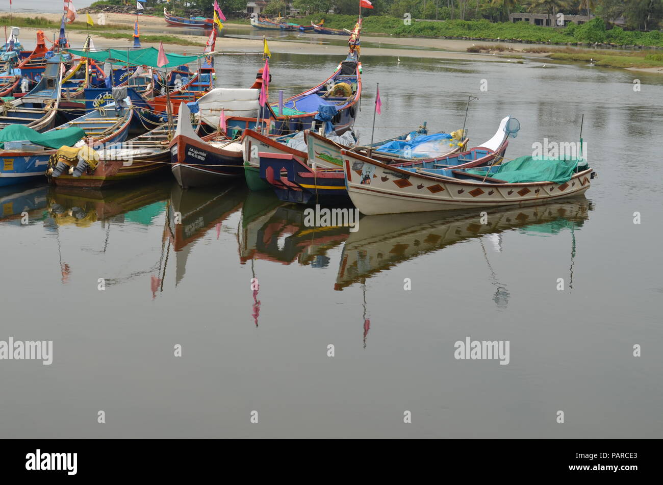 Many crowded fishing boats Stock Photo - Alamy