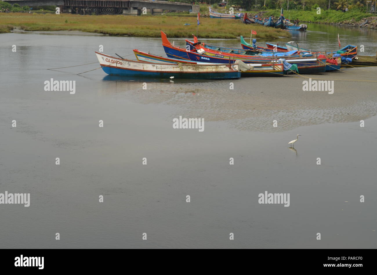 Many crowded fishing boats Stock Photo - Alamy