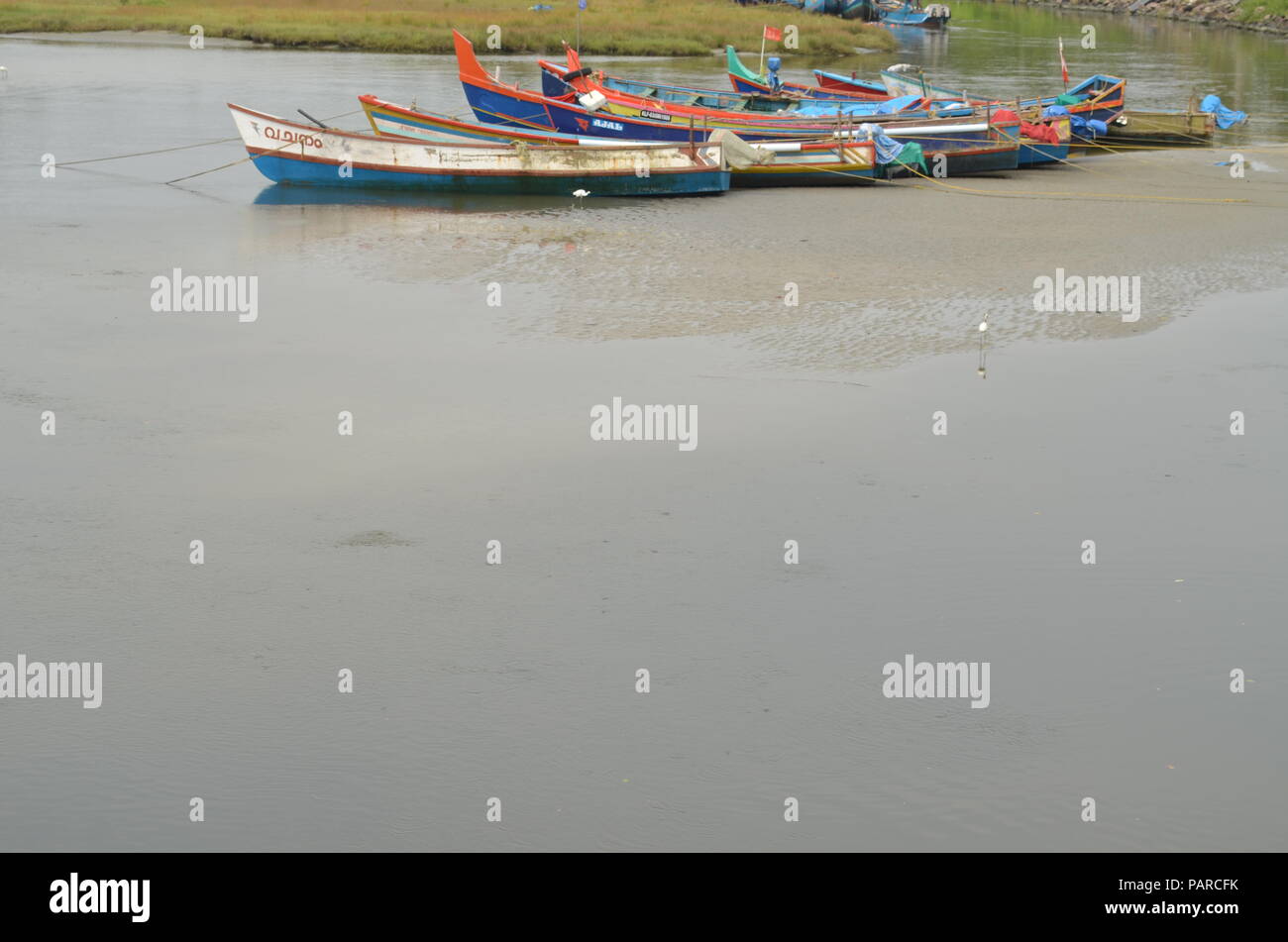 Many crowded fishing boats Stock Photo - Alamy