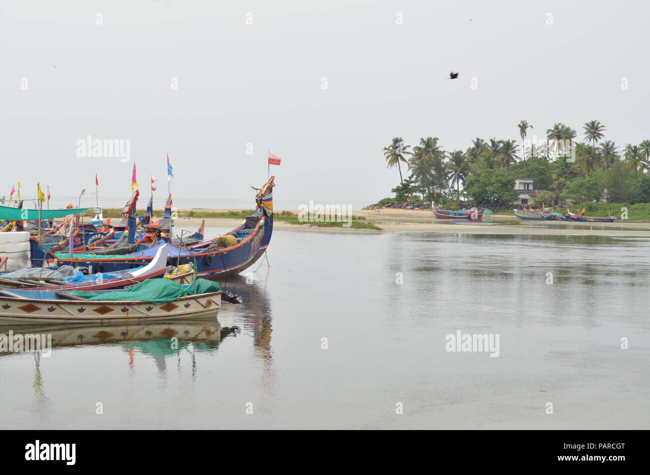 Many crowded fishing boats Stock Photo - Alamy
