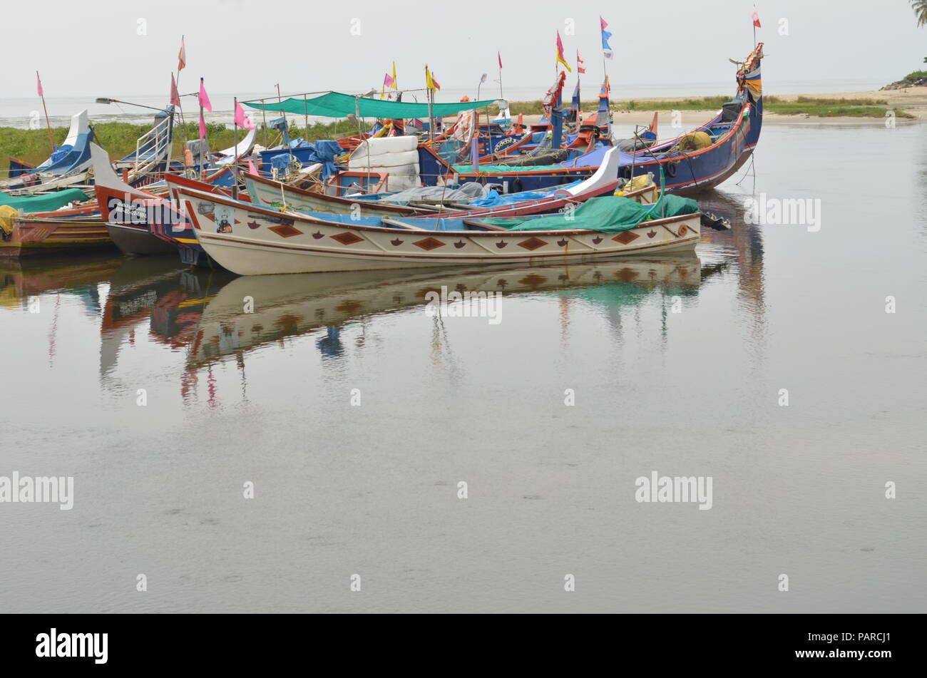 Many crowded fishing boats Stock Photo - Alamy