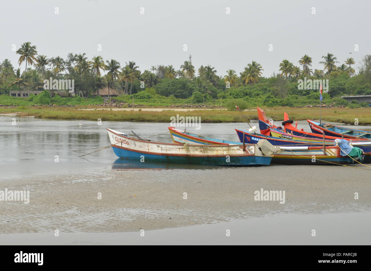 Many crowded fishing boats Stock Photo - Alamy