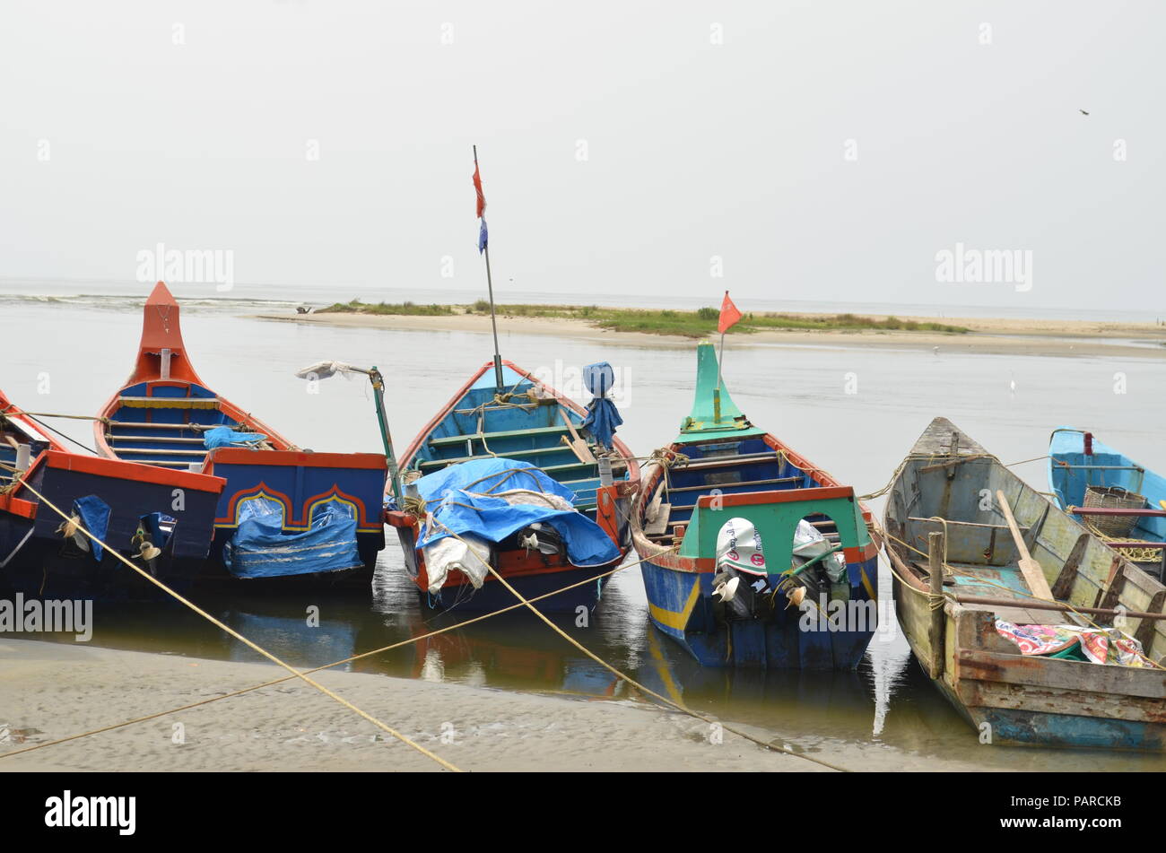Many crowded fishing boats Stock Photo - Alamy