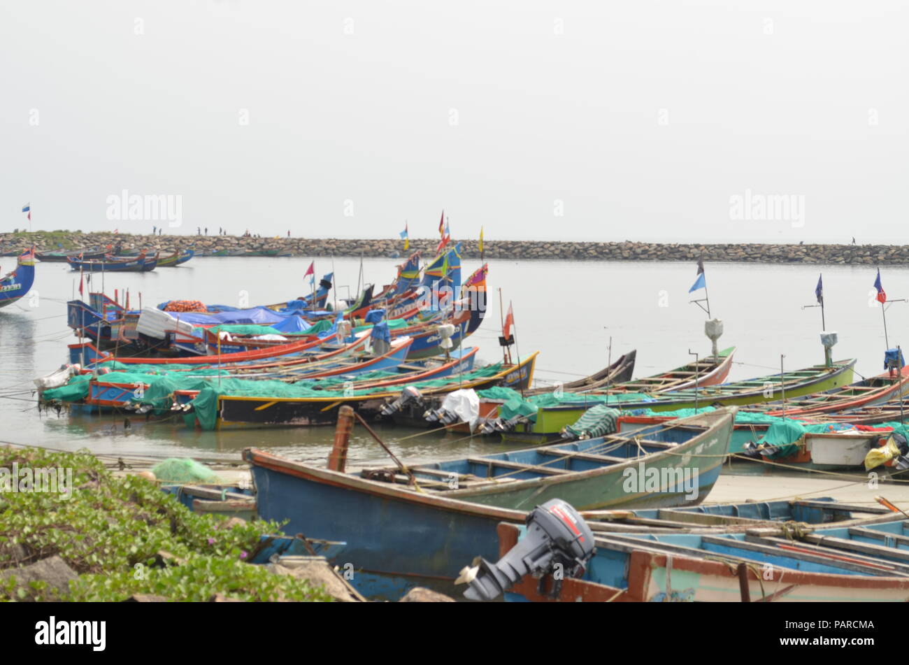 Many crowded fishing boats Stock Photo - Alamy