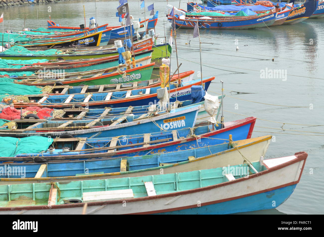 Many crowded fishing boats Stock Photo - Alamy