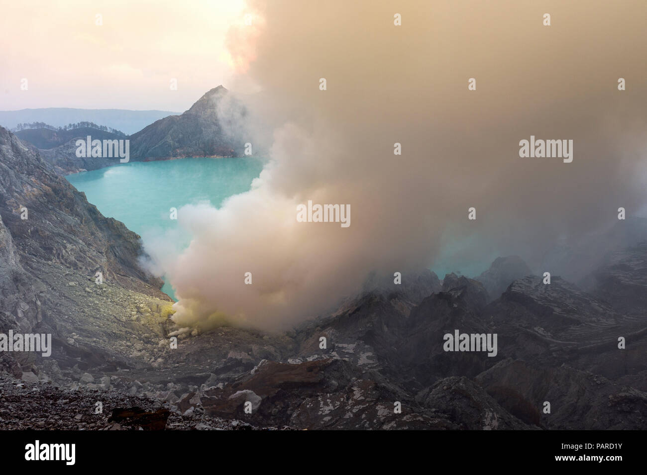 Sulfur fumes from the crater of Kawah Ijen Volcano in Indonesia Stock ...