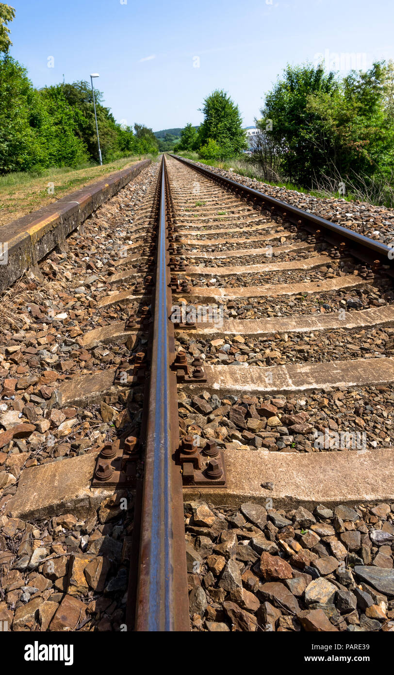 Long rail tracks – portrait Stock Photo - Alamy