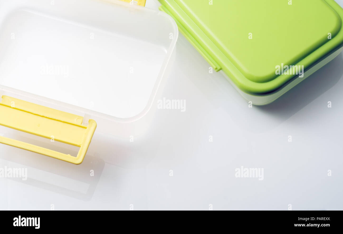 Plastic food container on the table Stock Photo - Alamy