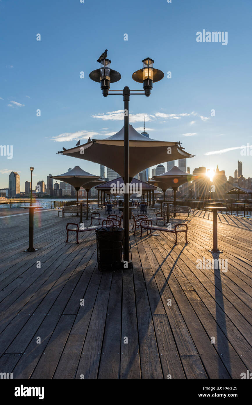 USA, New York City, Manhattan, New Jersey, waterfront at sunset Stock ...