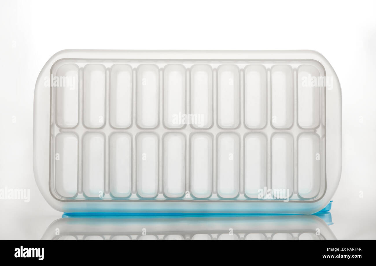 Plastic ice container on the table Stock Photo - Alamy