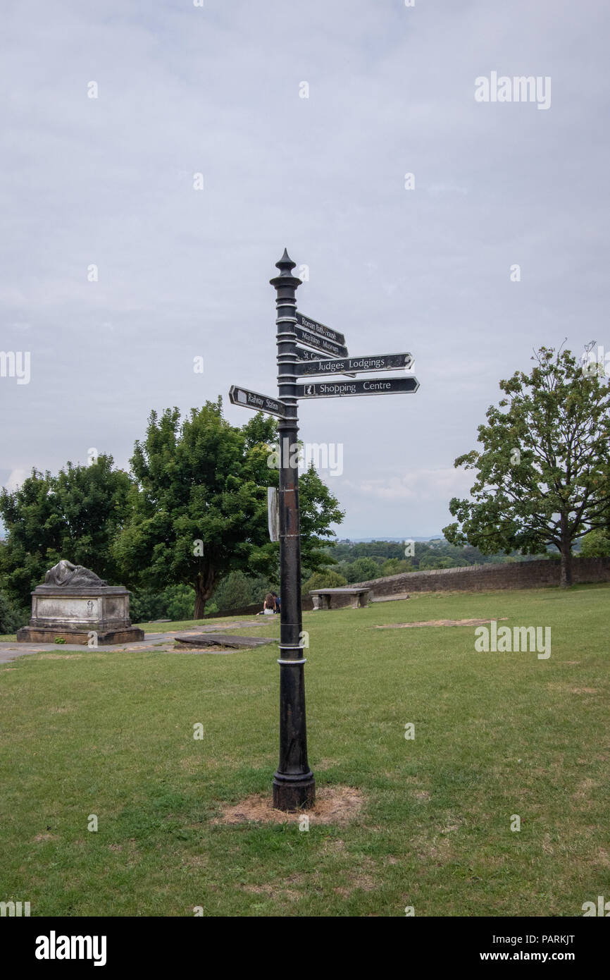 Street signs and information boards in the Lancashire city town of ...
