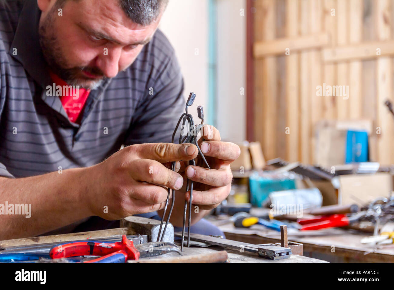 Sculptor is giving stance, attitude to his figures made of metal wire ...