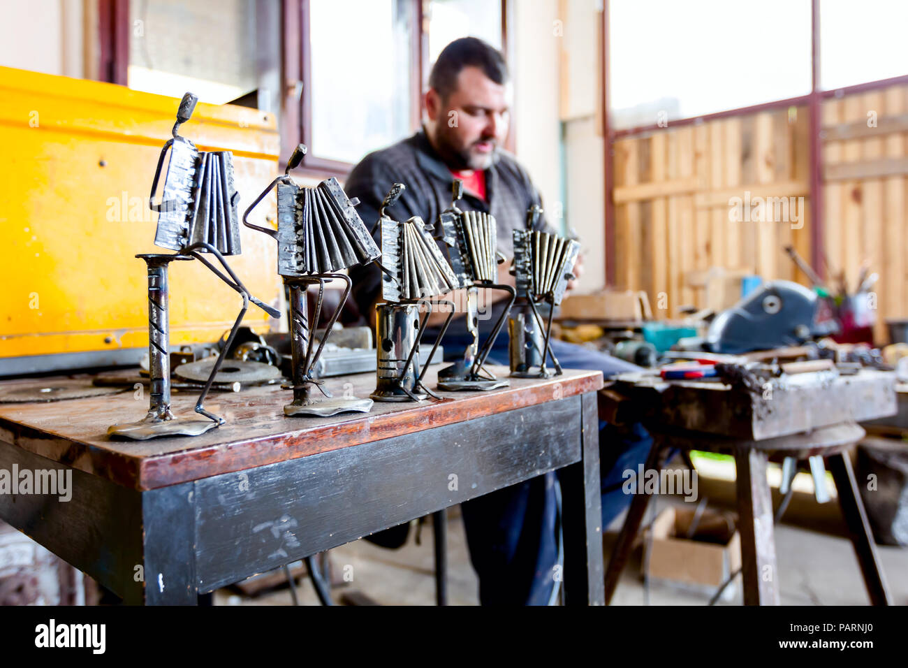 Craftsman making figure metal wire hi-res stock photography and images ...