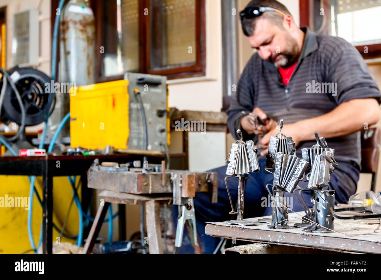 Craftsman making figure metal wire hi-res stock photography and images ...