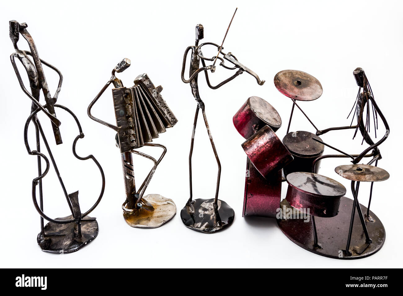 Figures of music performers are playing together, violoncellist ...