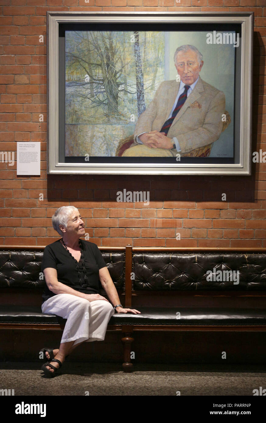 Victoria Crowe sits beside her specially-commissioned portrait of the ...