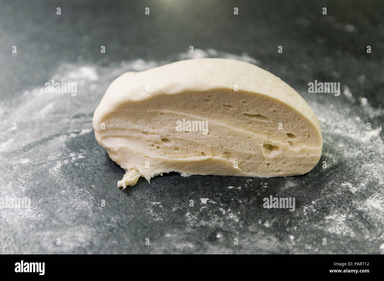Preparation of pizza dough, dough resting Stock Photo - Alamy