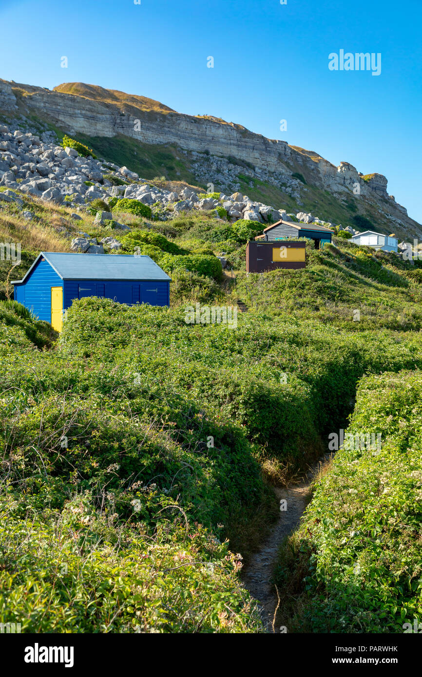 Portland Dorset England July 24, 2018 Beach huts on the West Meares ...
