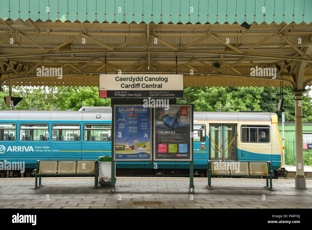 Station sign above a platform on Cardiff Central railway station with a ...