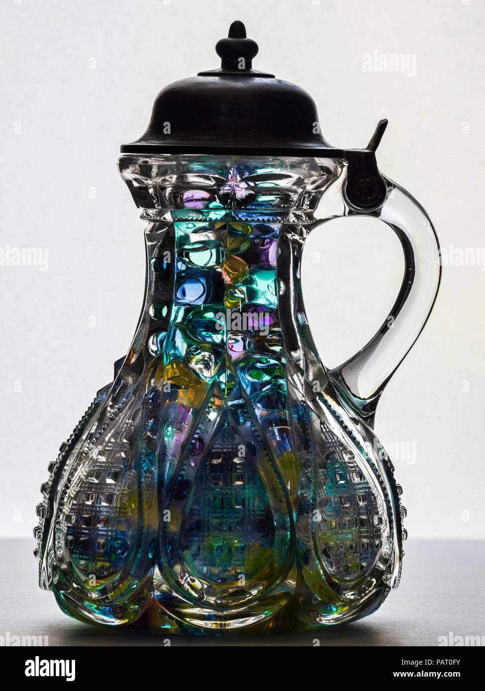 colored balls in syrup dispenser Stock Photo - Alamy