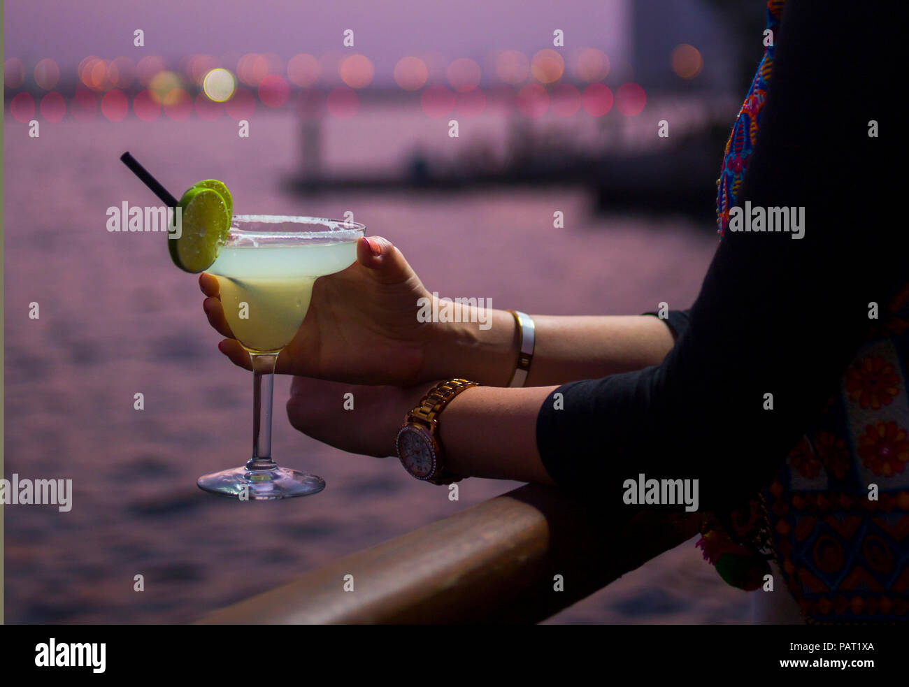 Female holding cocktail hi-res stock photography and images - Alamy