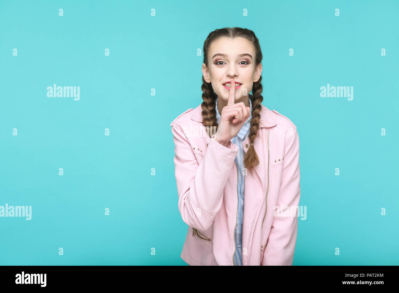 secret finger, portrait of beautiful cute girl standing with makeup and ...