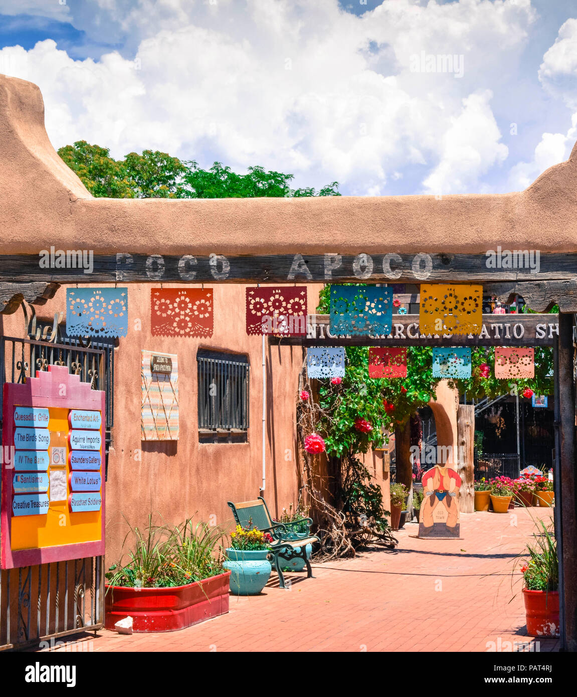 Colorful entrance to the courtyard of the Old town Poco A Poco Plaza ...