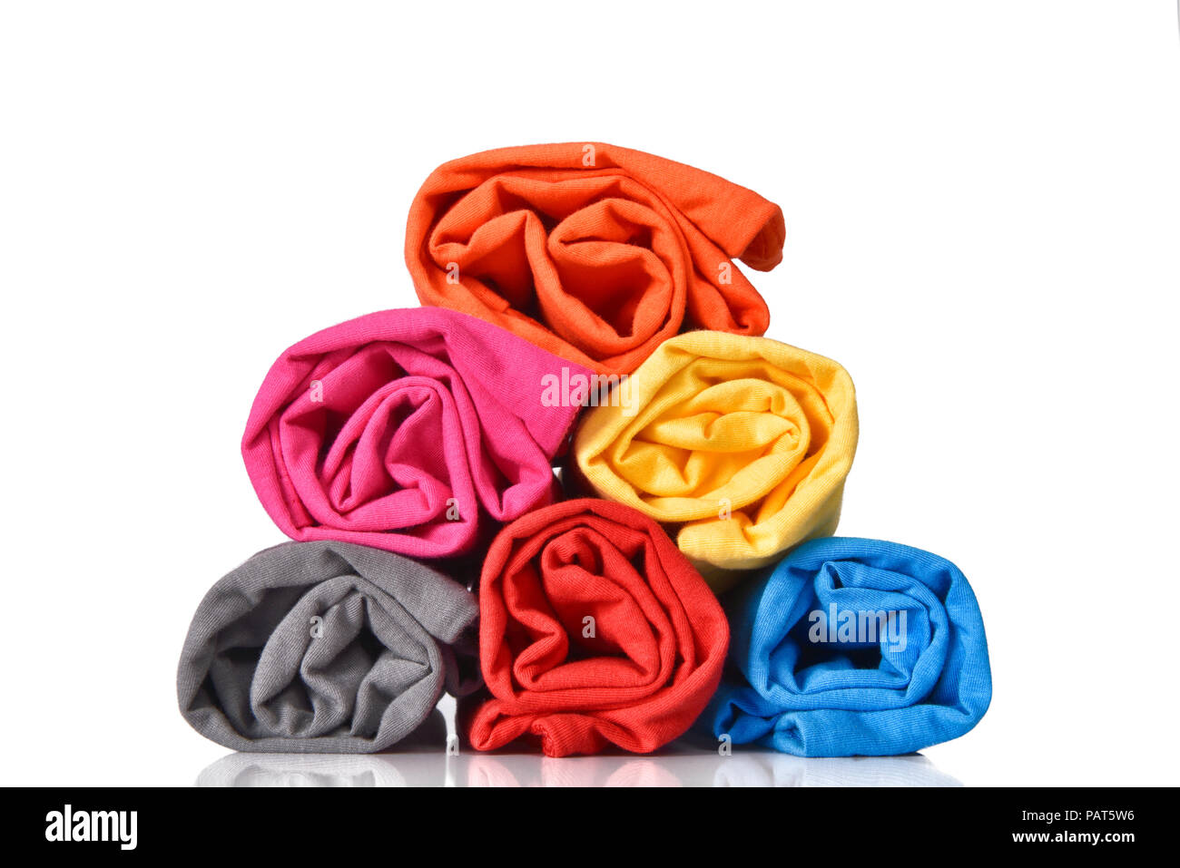 Colored clothes roll isolated over white background Stock Photo - Alamy