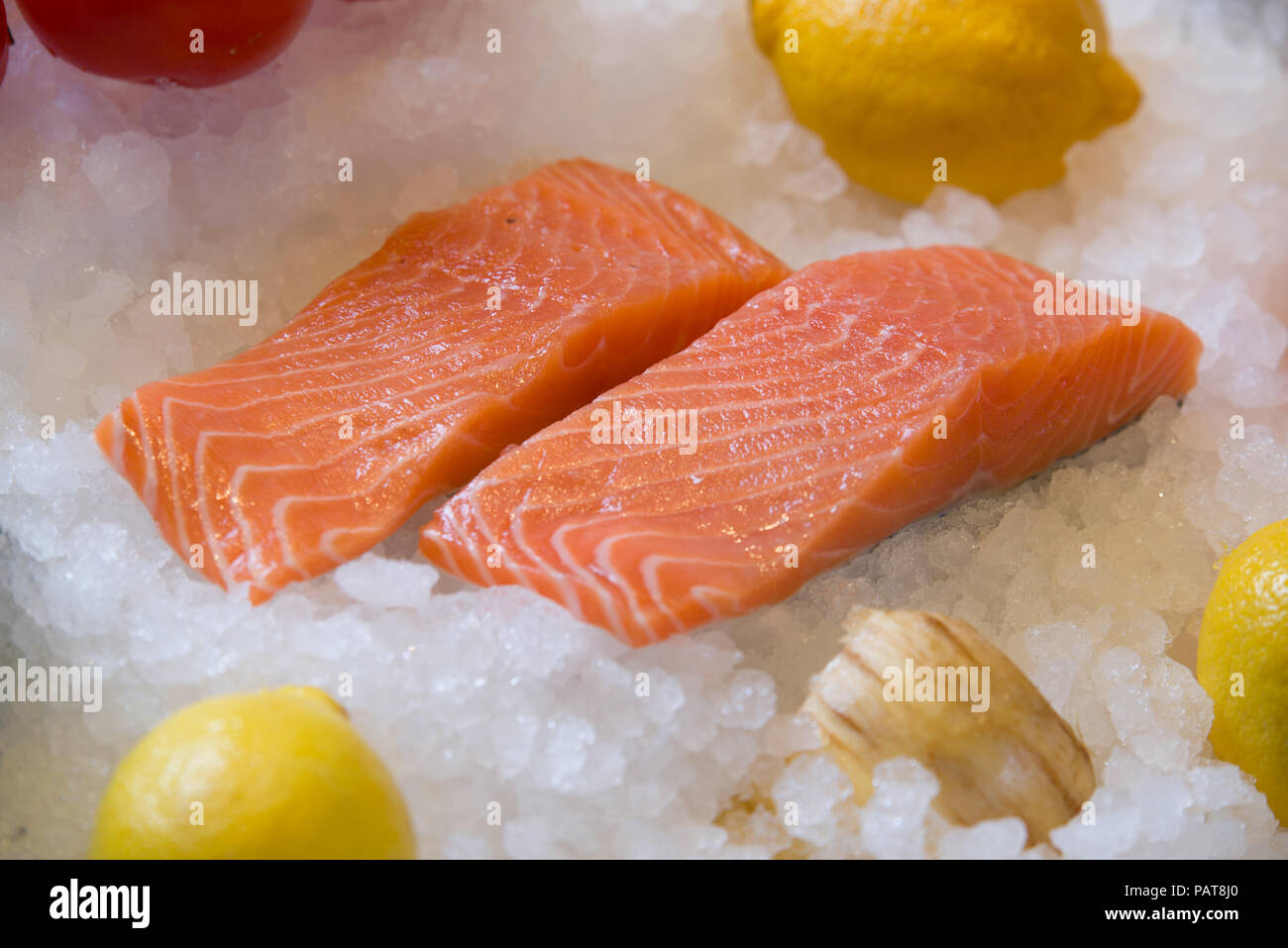Fresh salmon fillet on ice Stock Photo - Alamy