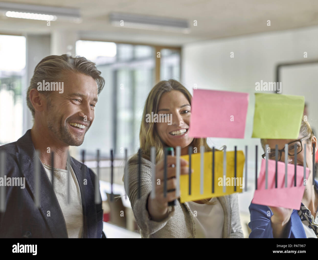 Happy colleagues hi-res stock photography and images - Alamy