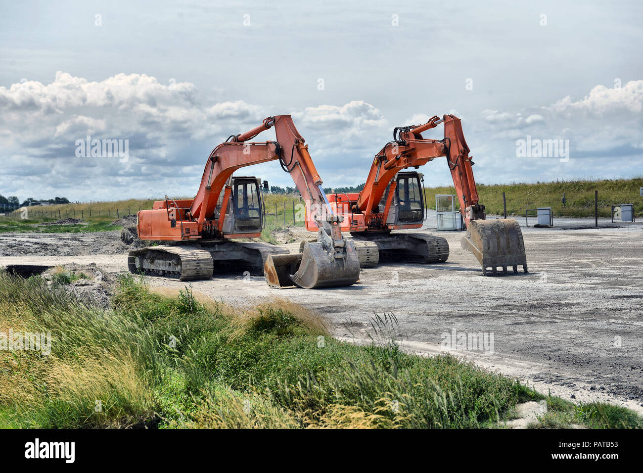 two excavators on site Stock Photo - Alamy