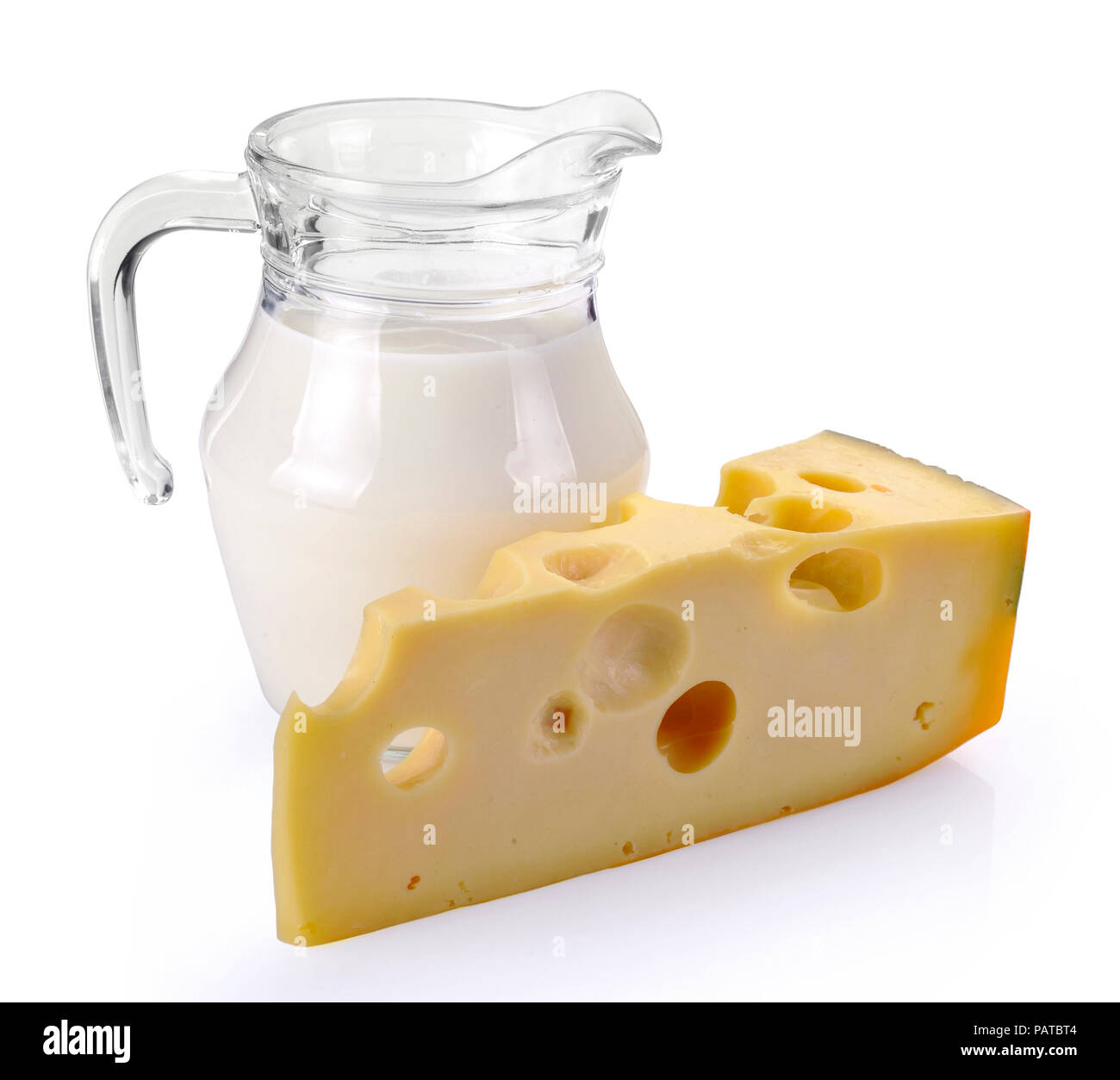pitcher of milk and cheese on a white background Stock Photo - Alamy